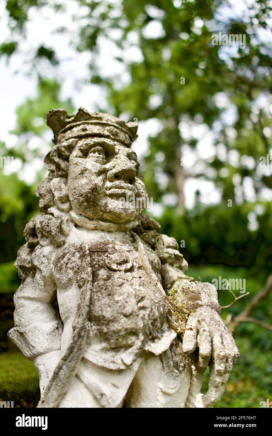 Moss covered statues at Greenwood Gardens in Millburn, NJ, USA. These ...