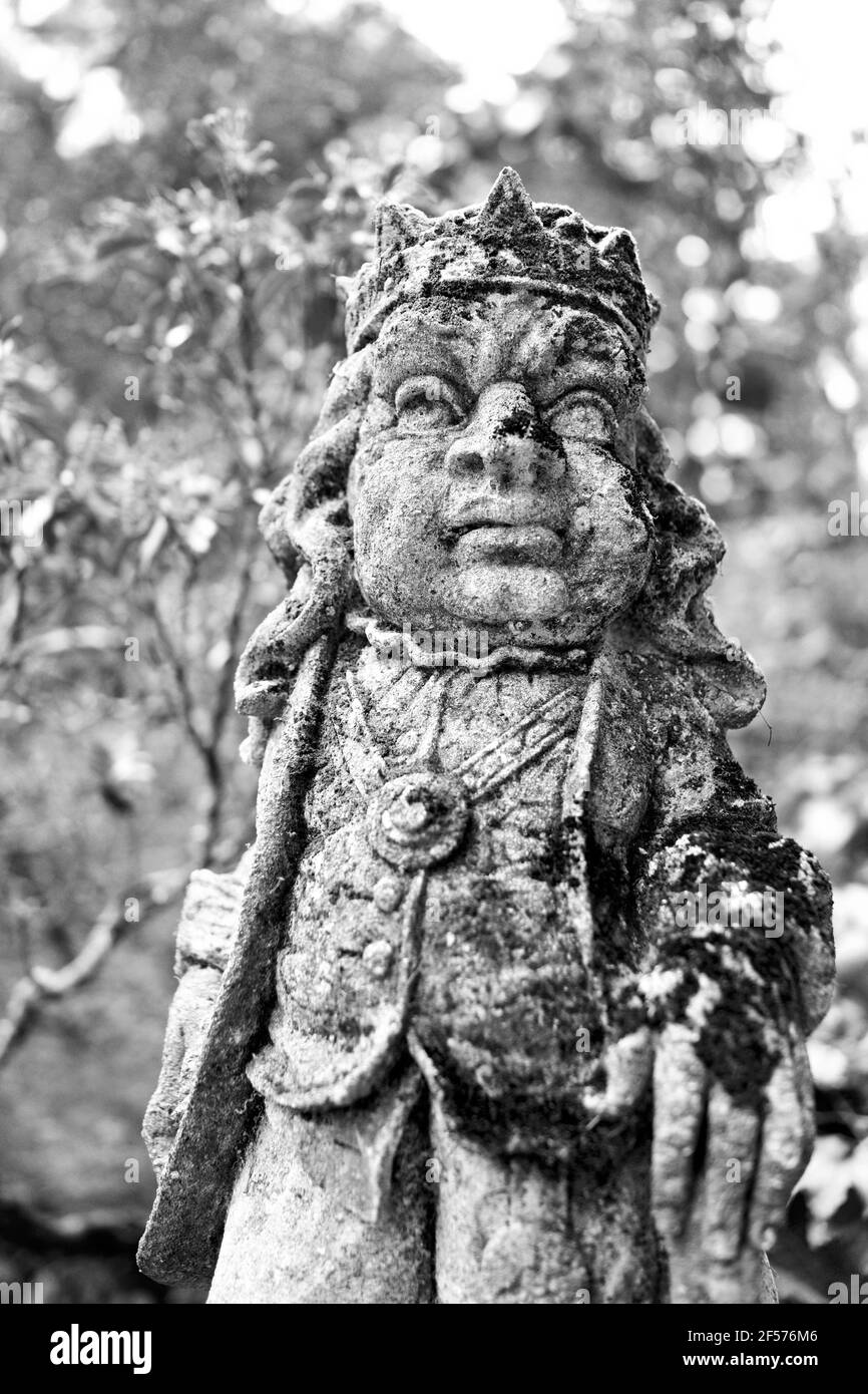 Moss covered statues at Greenwood Gardens in Millburn, NJ, USA. These ...