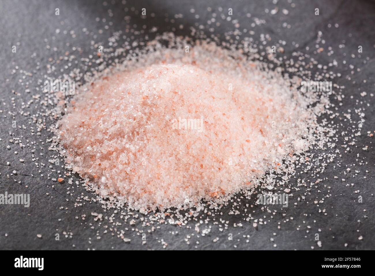 Fine grains of pink Himalayan salt, powder red rock salt from Pakistan ...