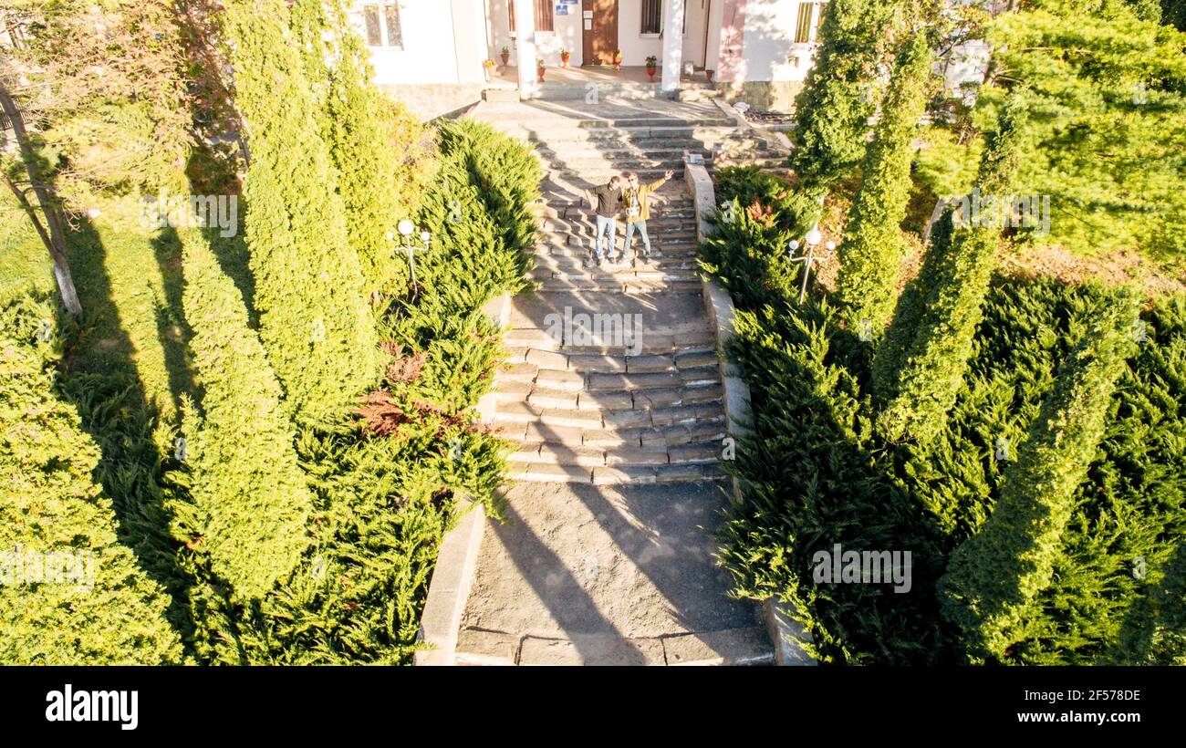 Two guys are standing on the steps. View from above Stock Photo - Alamy