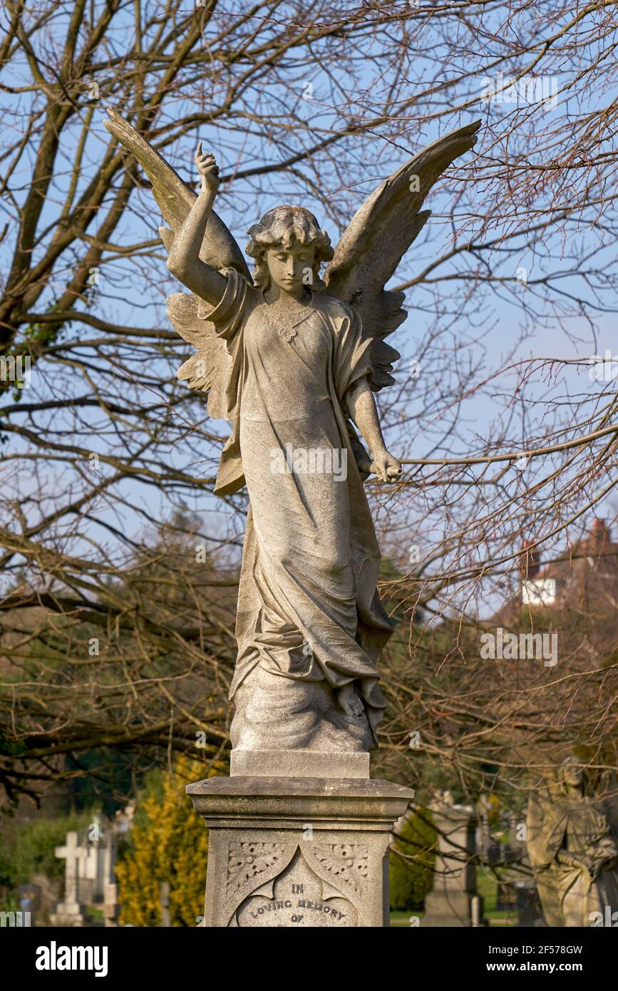 statue of an angel graveyard Stock Photo - Alamy