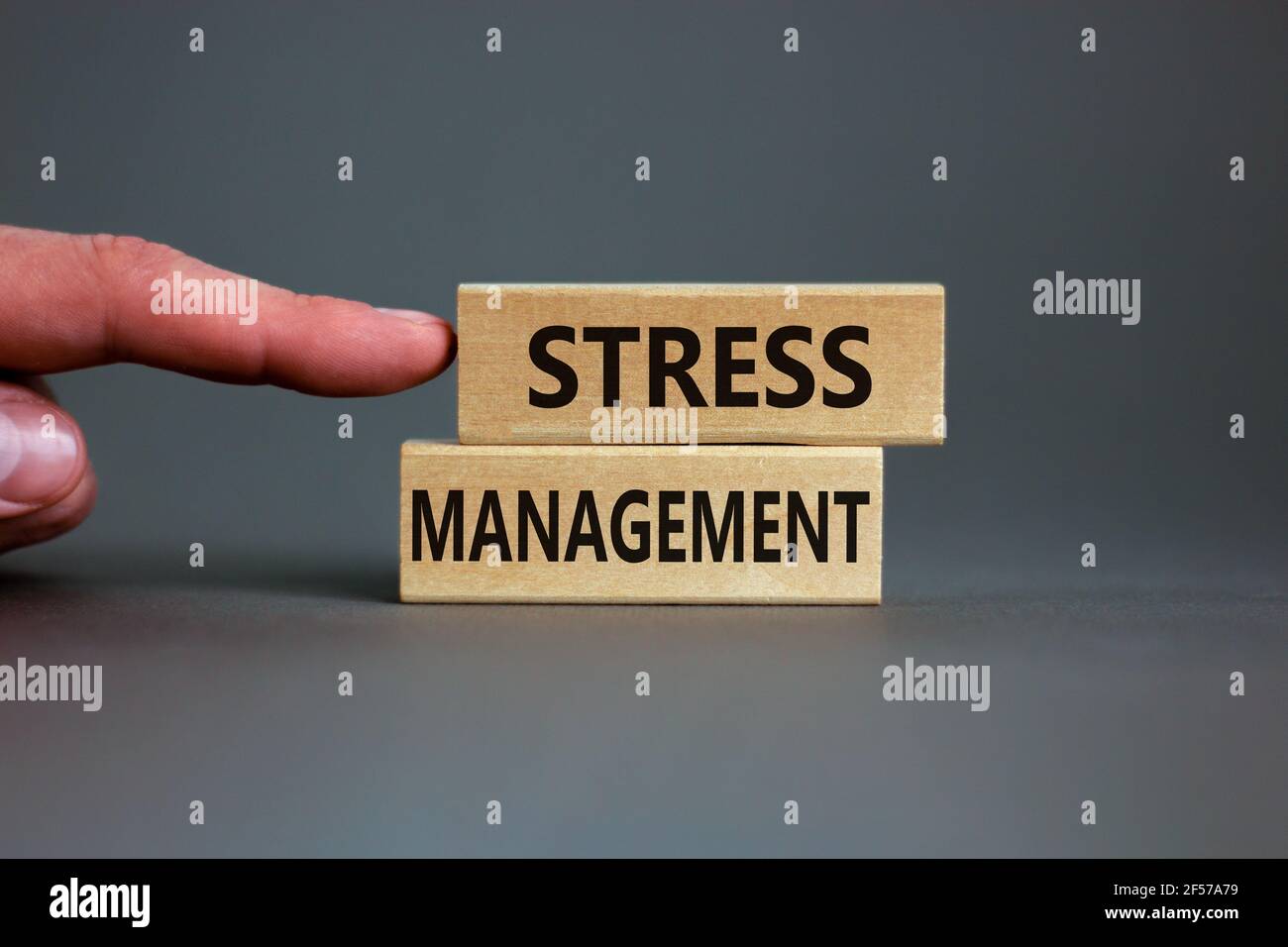 Stress management symbol. Wooden blocks with words 'Stress management ...