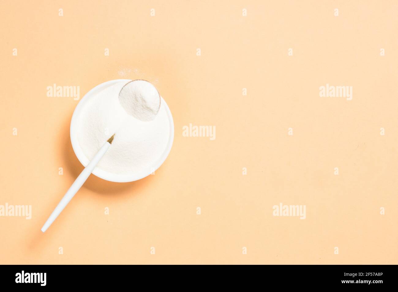 Collagen powder dietary supplement at blue Stock Photo - Alamy