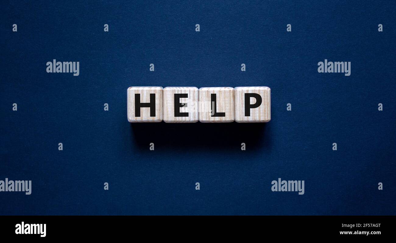 Support and help symbol. Wooden cubes with the word 'help'. Business ...