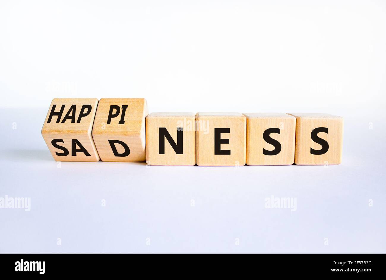 Happiness or sadness symbol. Turned cubes and changed the word 'sadness ...