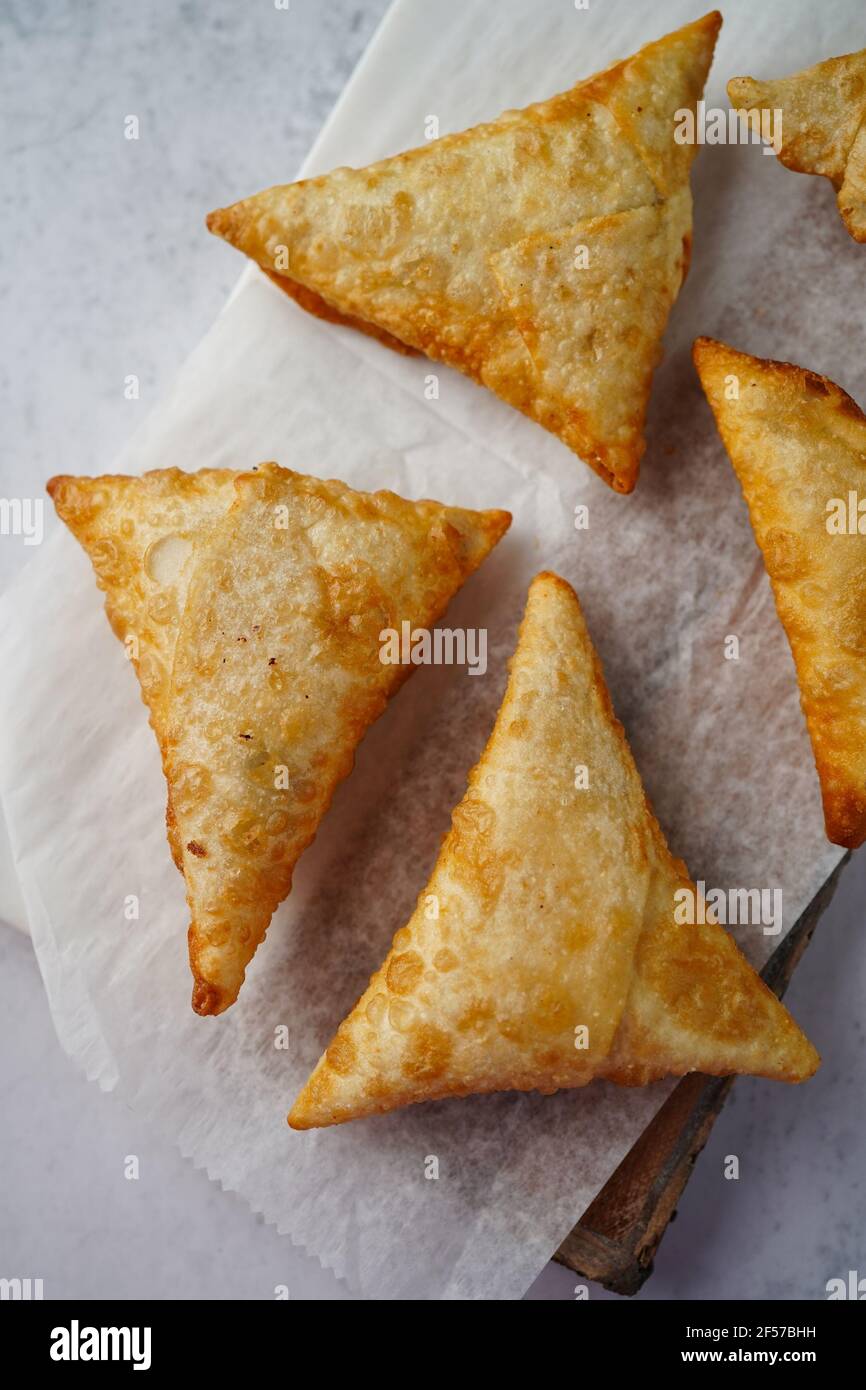 Homemade Samosas - Indian deep fried triangle pastries, selective focus ...