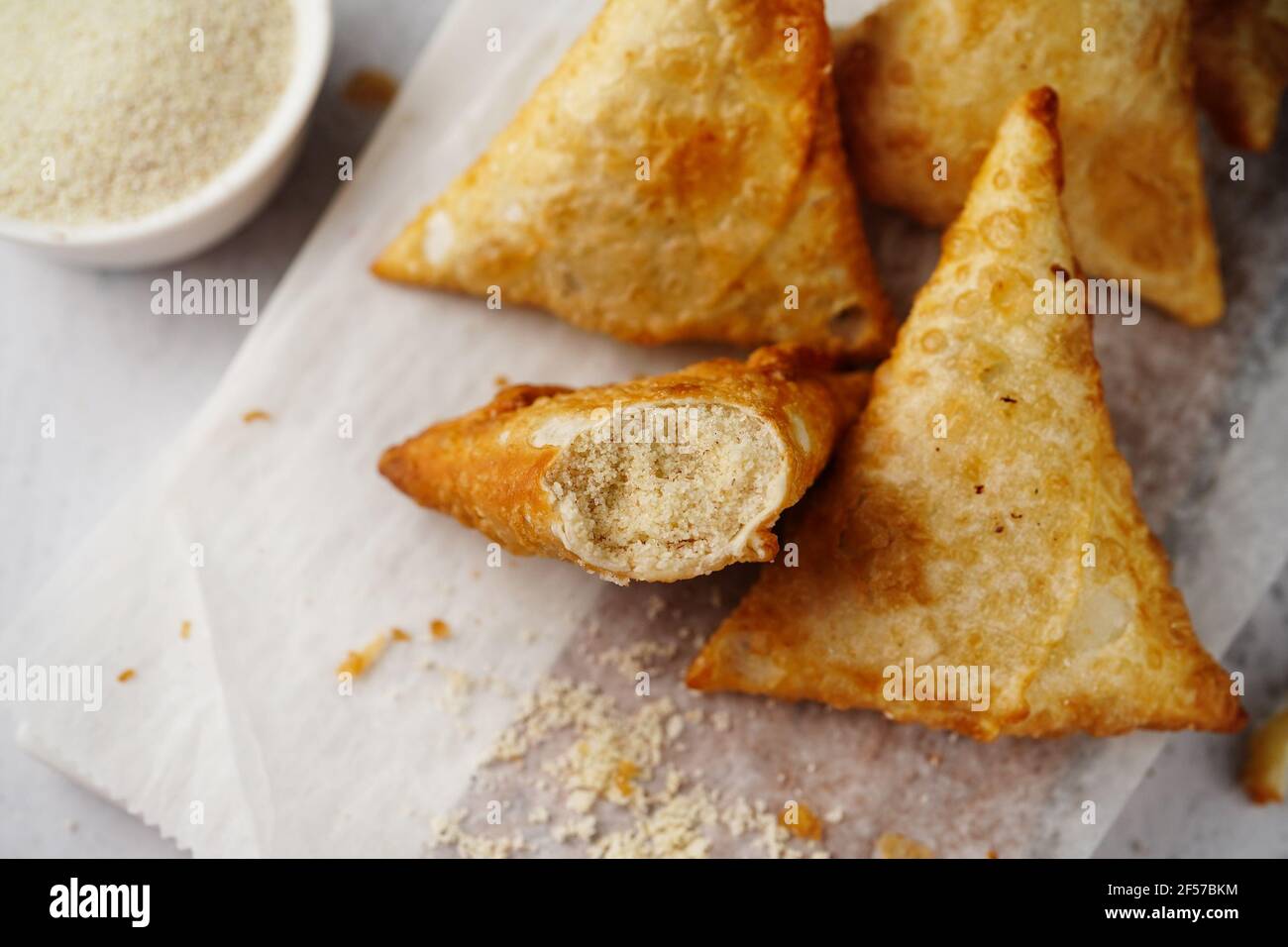 Malabar Thari Manda -Kerala deep fried snack with semlina filling ...