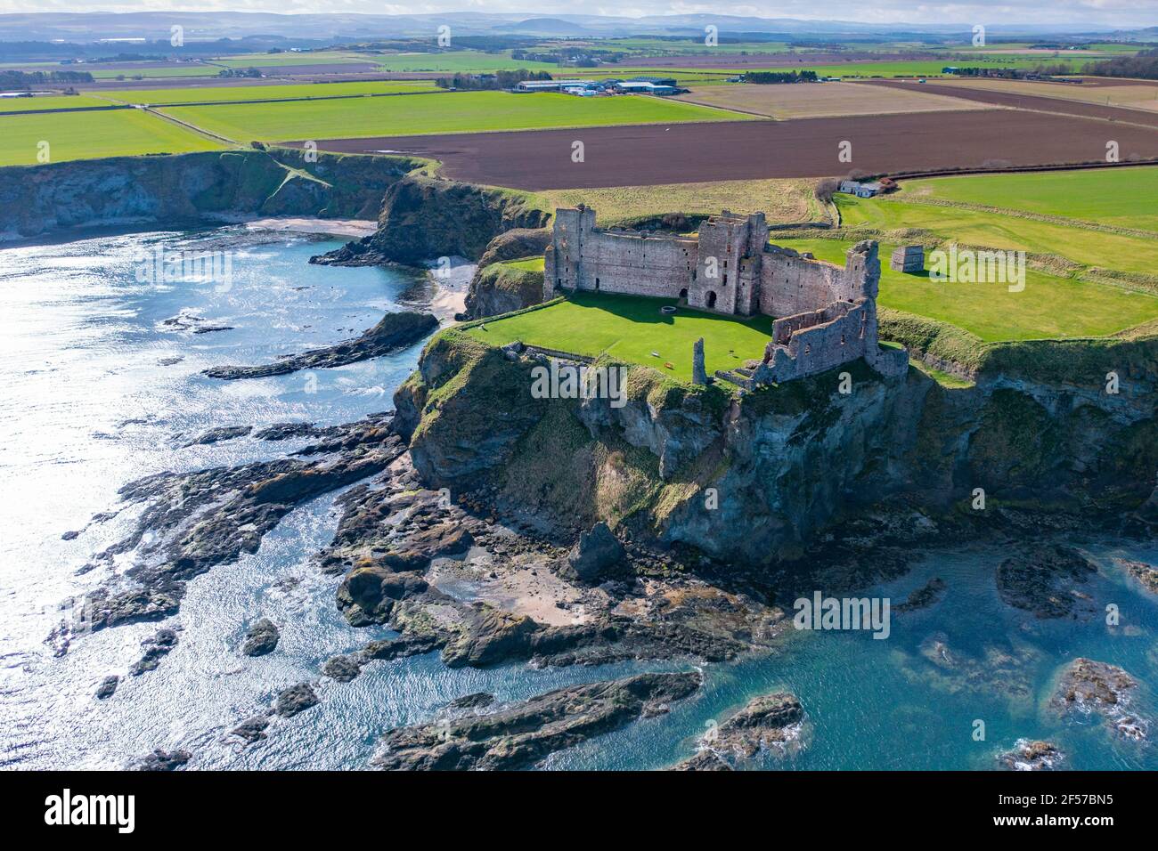 Aerial view of Tantallon Castle on cliffs above Firth of Forth in East ...