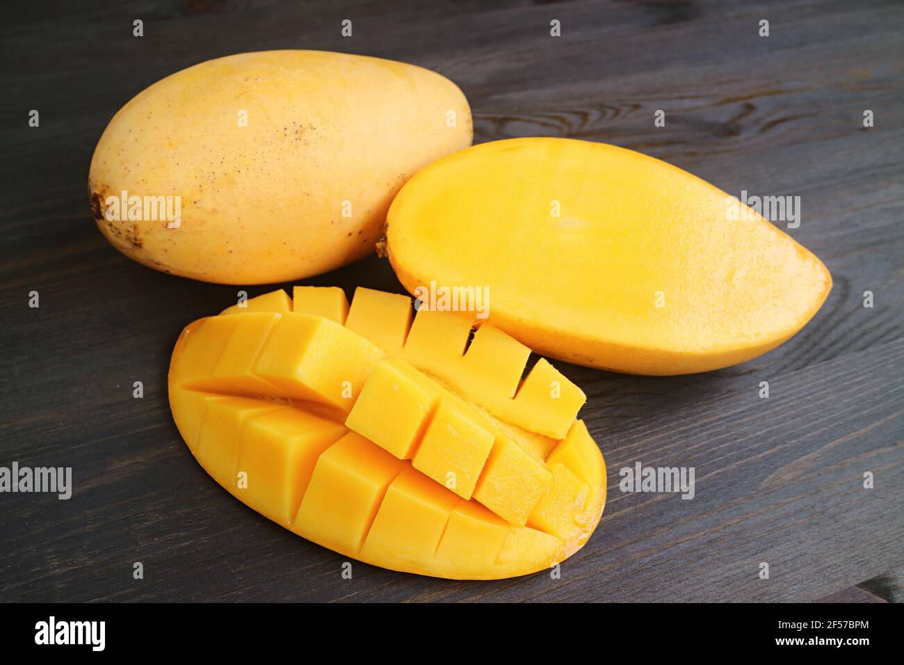Closeup Fresh Ripe Juicy Mango Cut in Half and Crosswise Cut with a ...