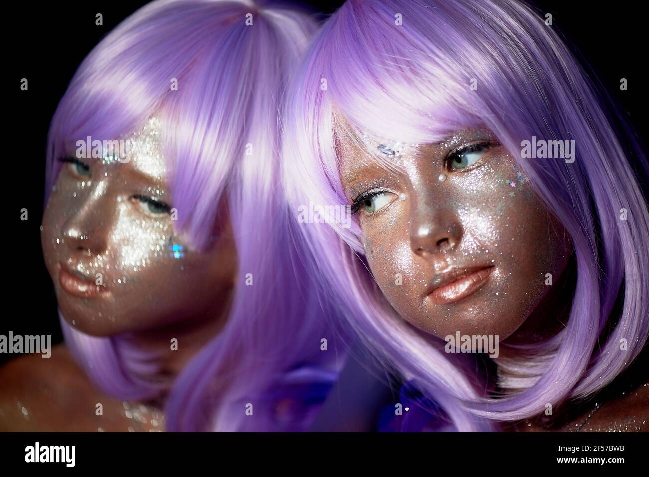 A girl with purple hair and glowing skin. An alien or a fairy with ...