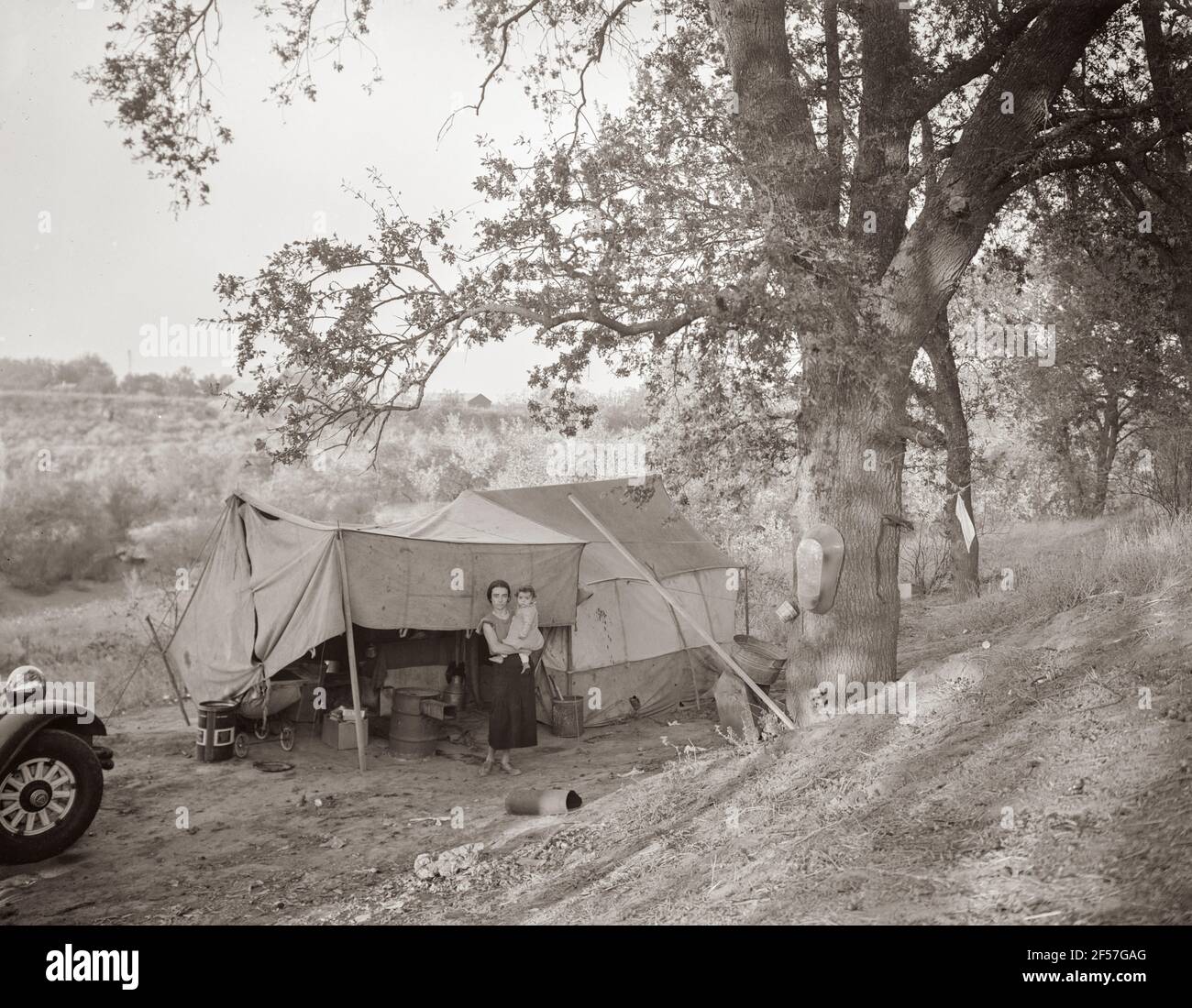 Wife and child of migrant worker, encamped near Winters, California ...