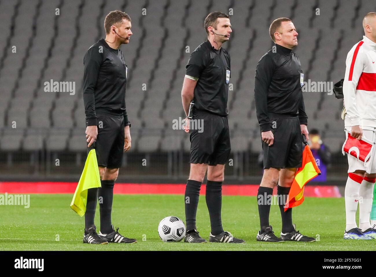 ISTANBUL, TURKEY - MARCH 24: assistant referee Stuart Burt, referee ...