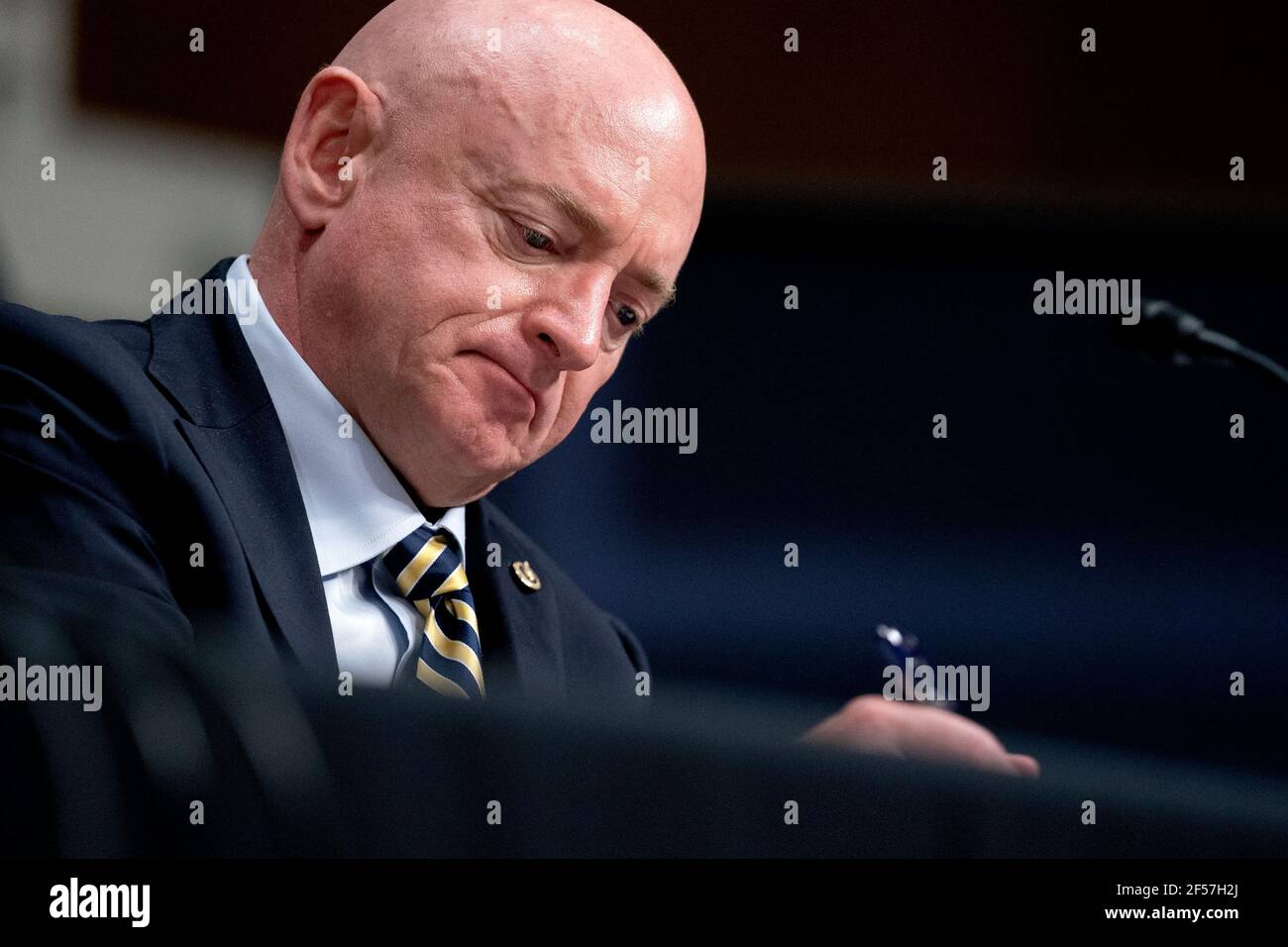 United States Senator Mark Kelly (Democrat of Arizona) listens during a ...