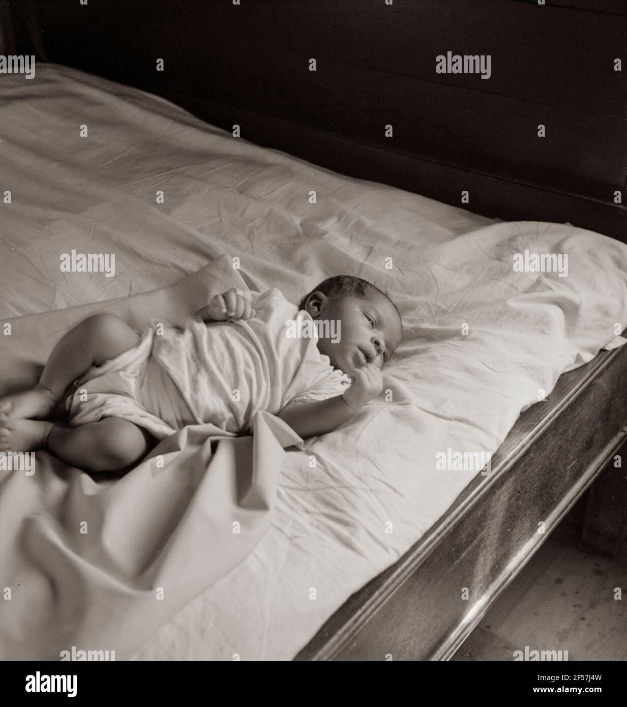 Young baby born on the Delta cooperative farm. Hillhouse, Mississippi ...