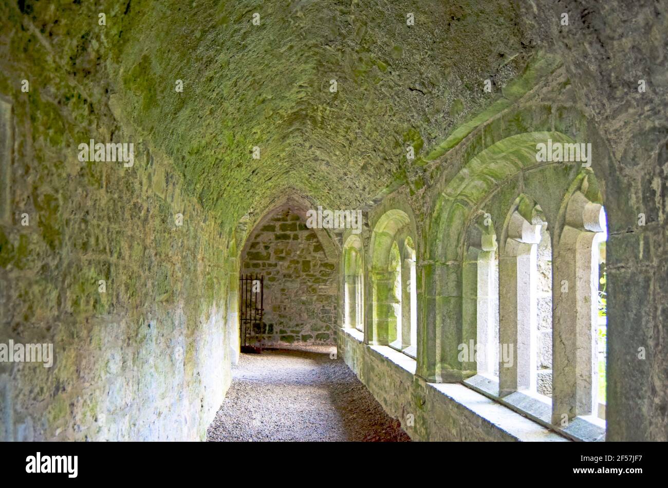 Old stone tunnel with scary windows Stock Photo - Alamy