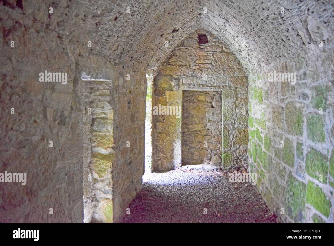Old and abandoned stone passageway Stock Photo - Alamy