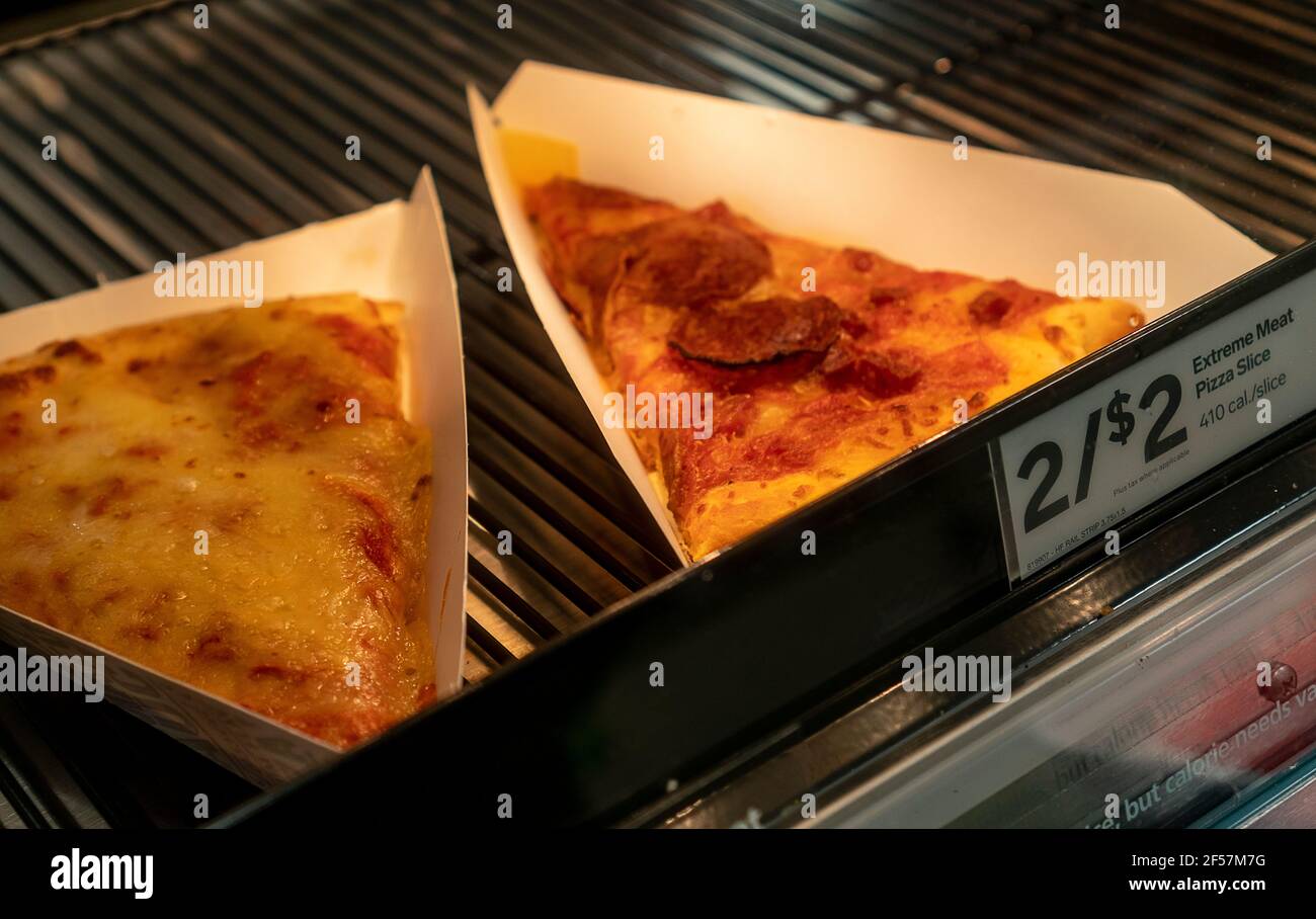 Sad, tired looking slices of convenience store pizza in a 7-11 in New ...