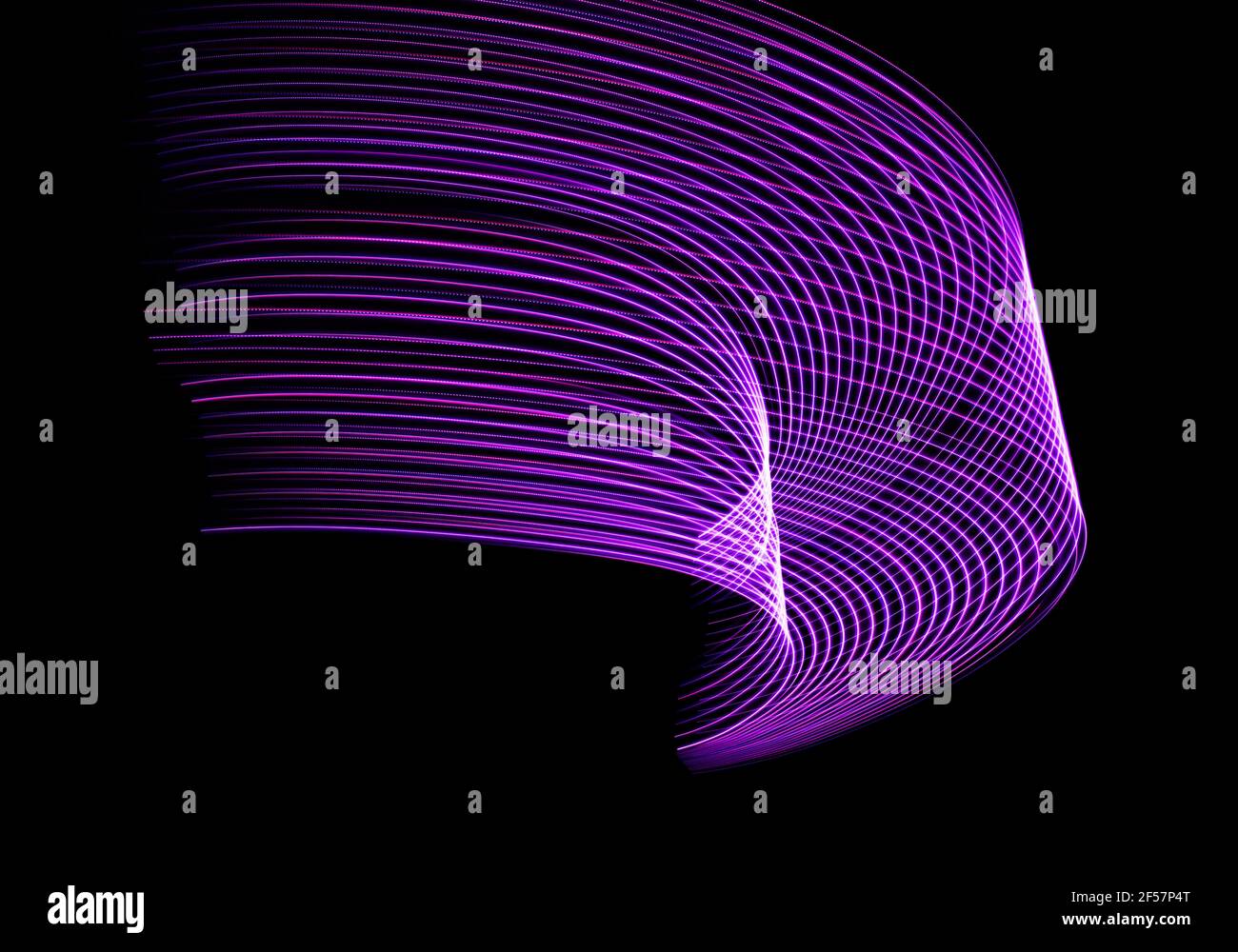 Abstract multicolor drawing on a black background, made using a light ...