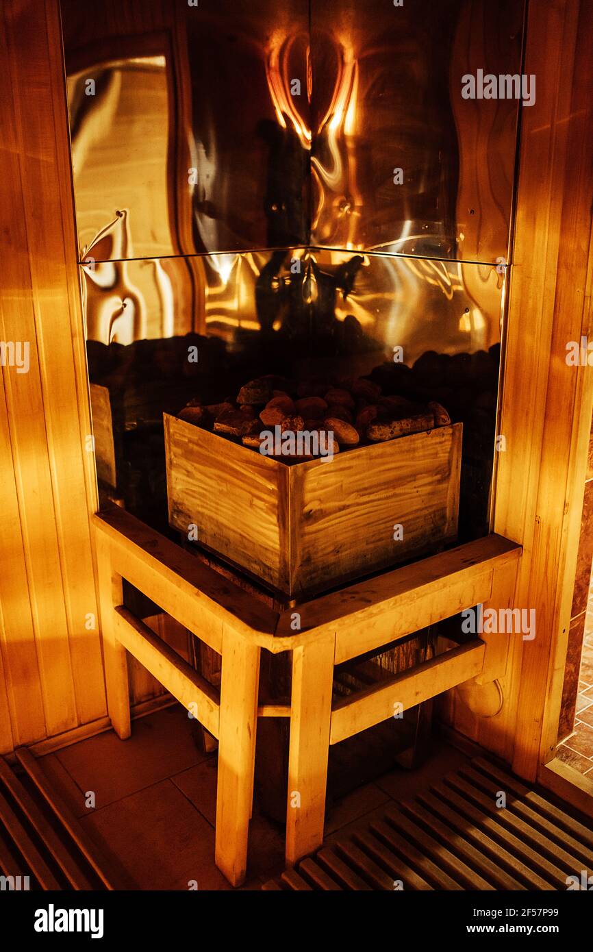 wooden table and chairs in the sauna. dressing room and steam room for ...