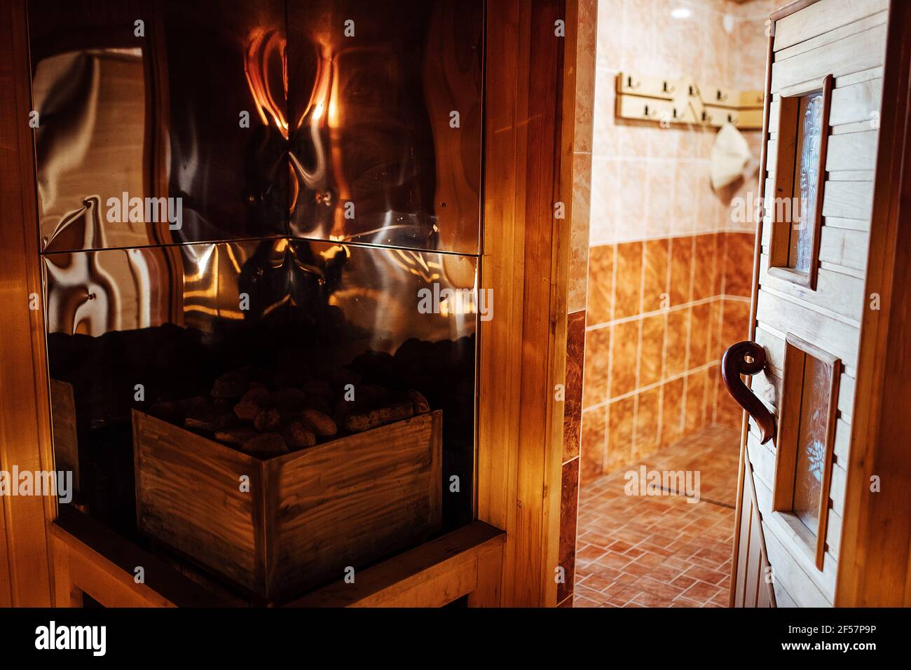 wooden table and chairs in the sauna. dressing room and steam room for ...