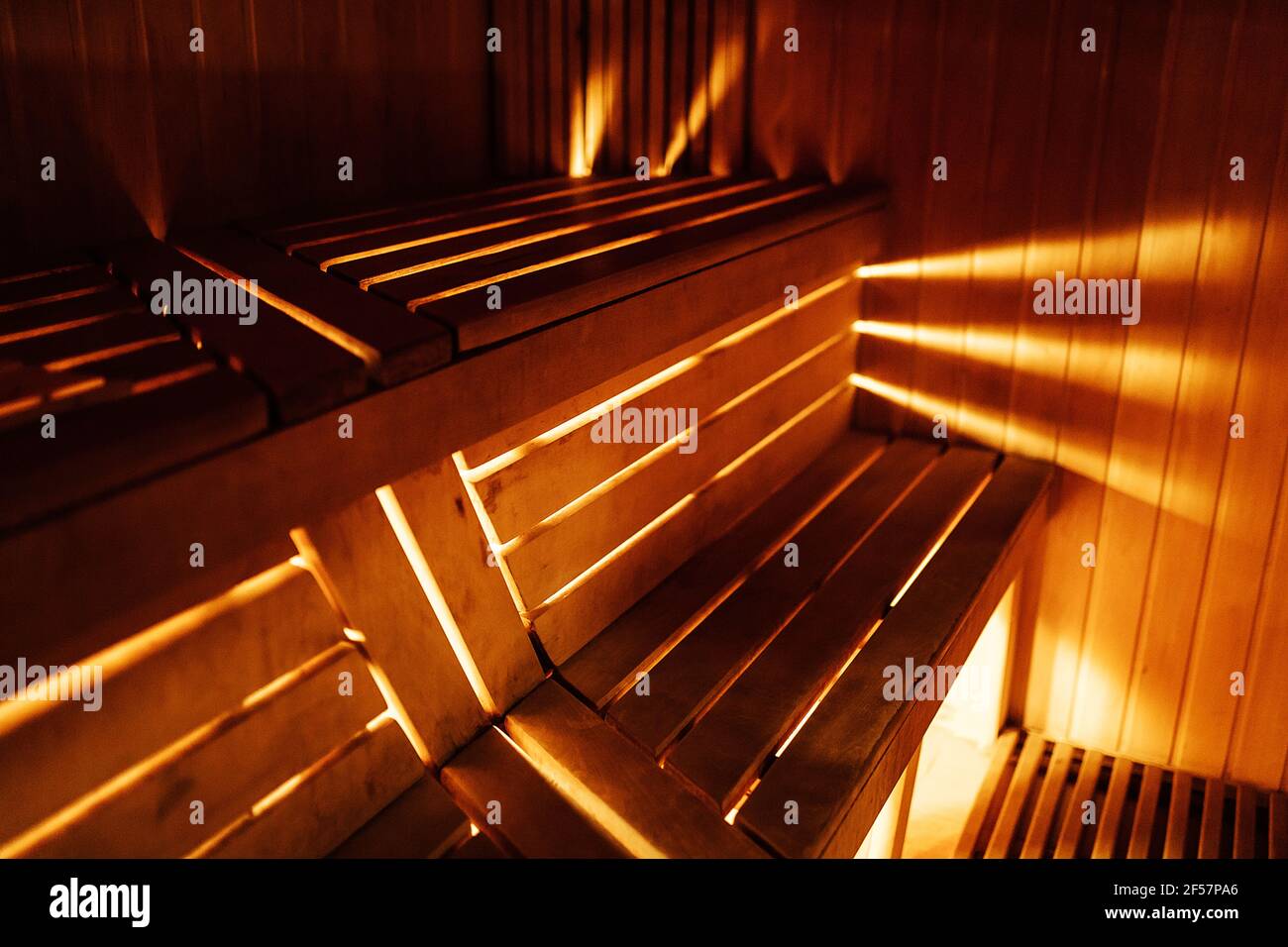 wooden table and chairs in the sauna. dressing room and steam room for ...