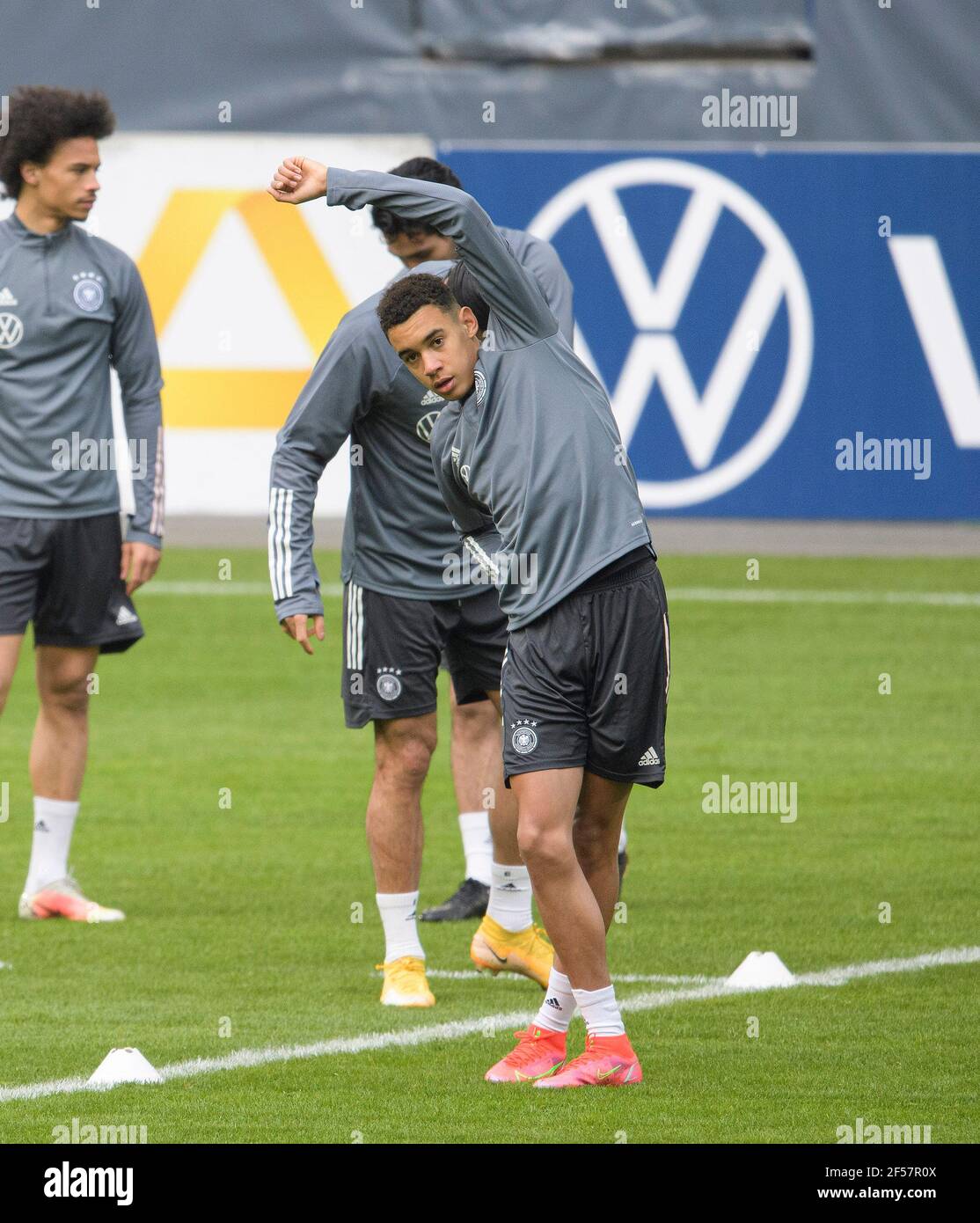 Jamal MUSIALA (GER) warming up, stretching exercises for the men's ...