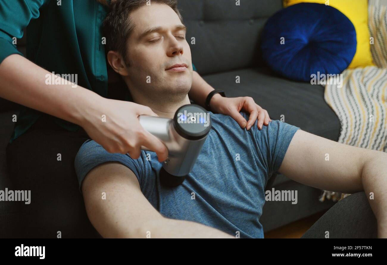 Woman massaging man hi-res stock photography and images - Alamy