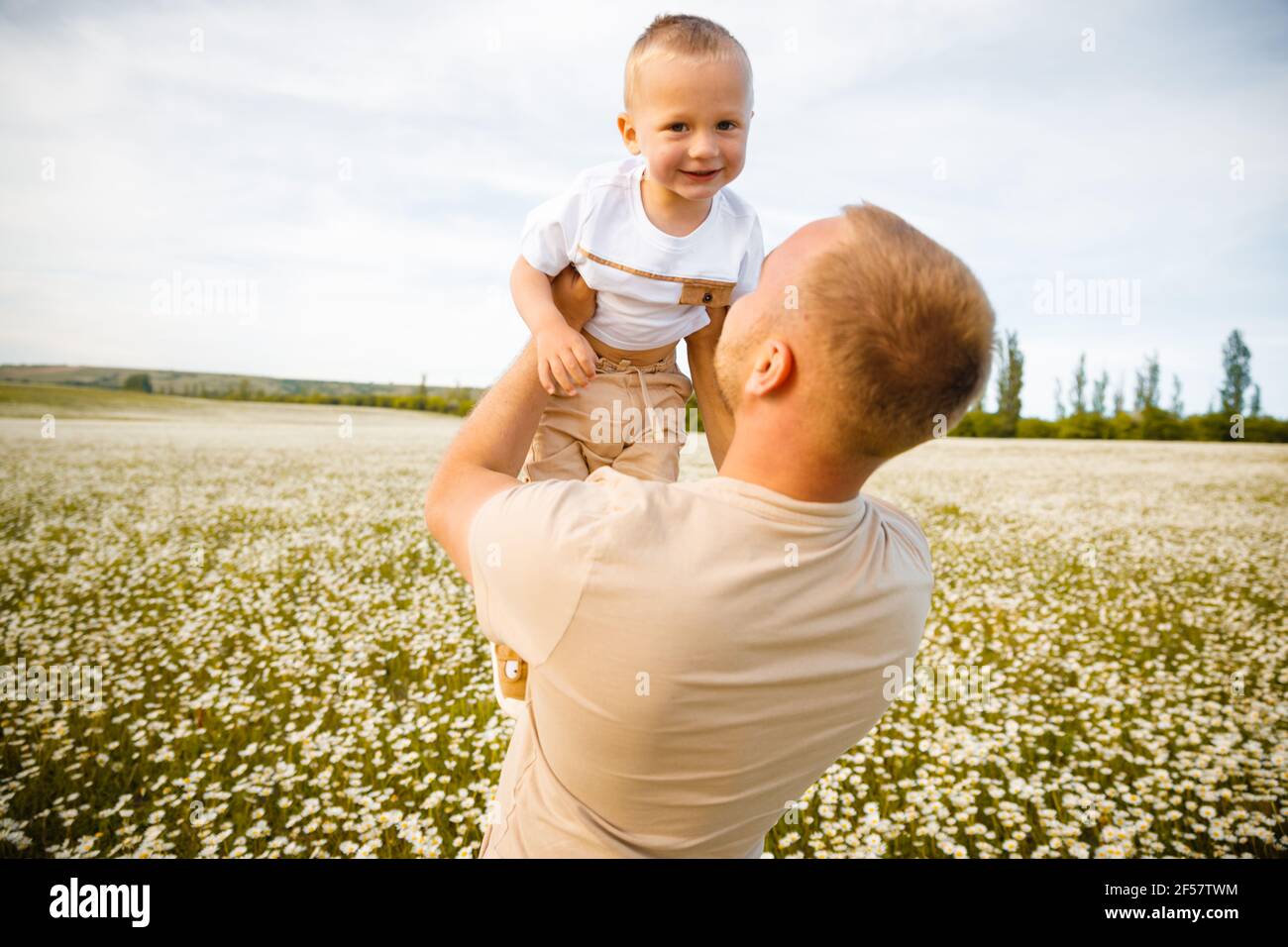 Happy childhood of a child with father Stock Photo - Alamy