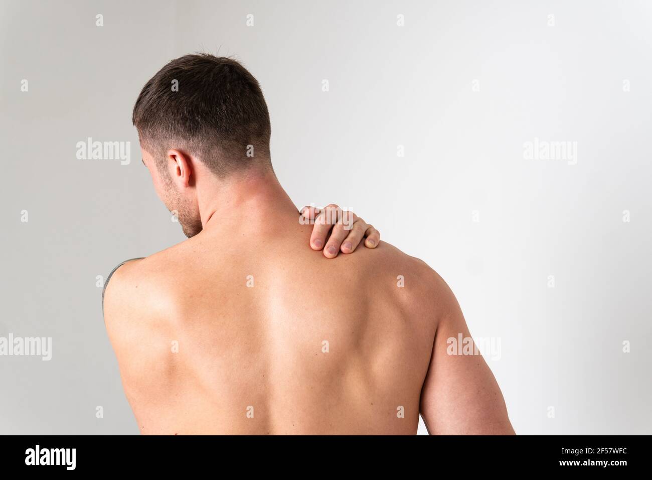 The muscles of the neck in a man on a white background are hurt body ...