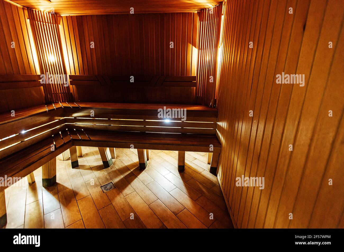 wooden table and chairs in the sauna. dressing room and steam room for ...