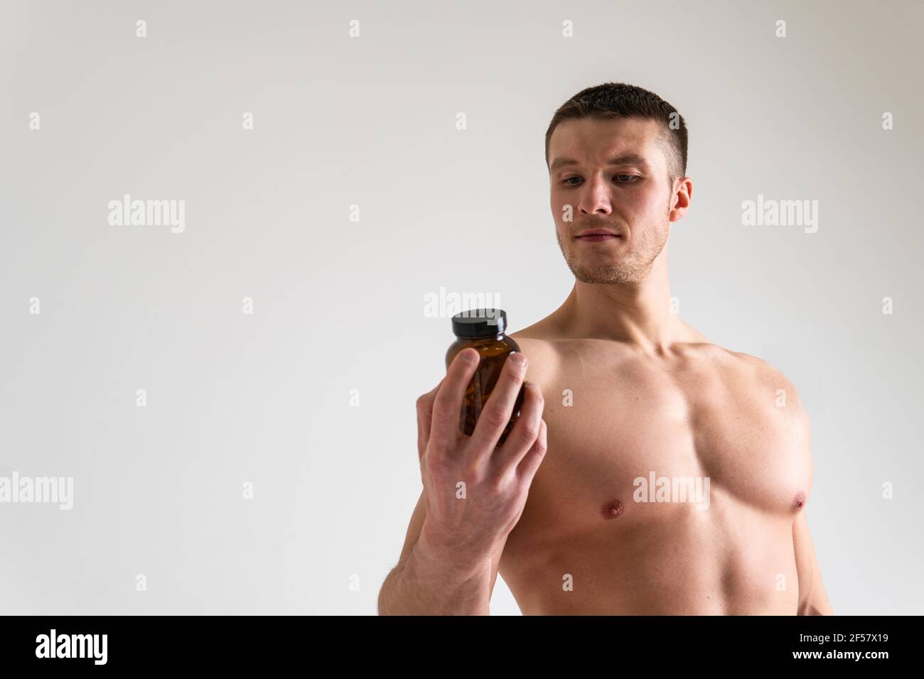 Fitness protein jars white on white background bodybuilder powder ...