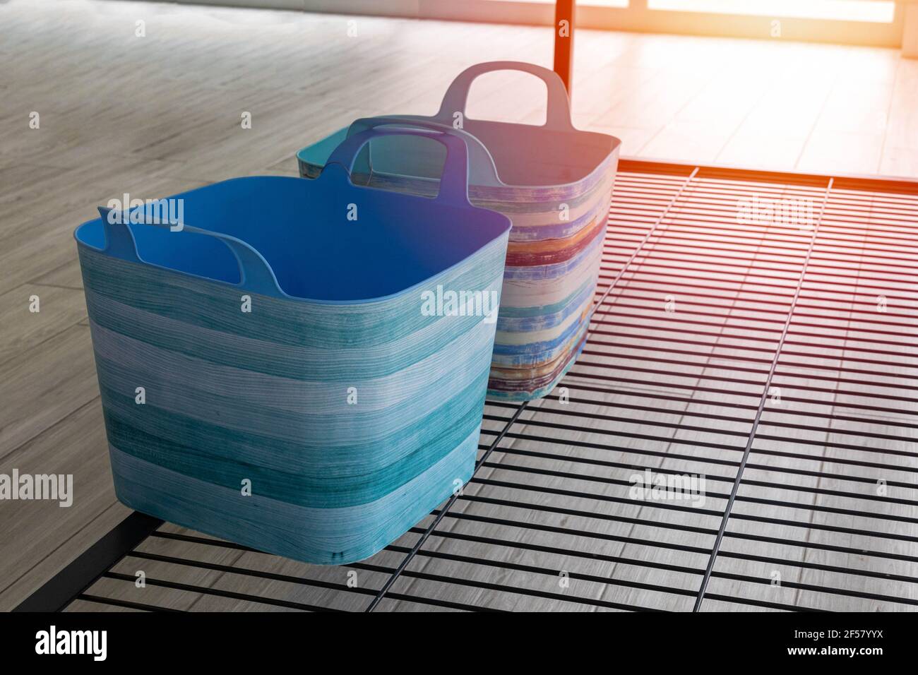 baskets for placing dirty or clean laundry in a washing machine and ...