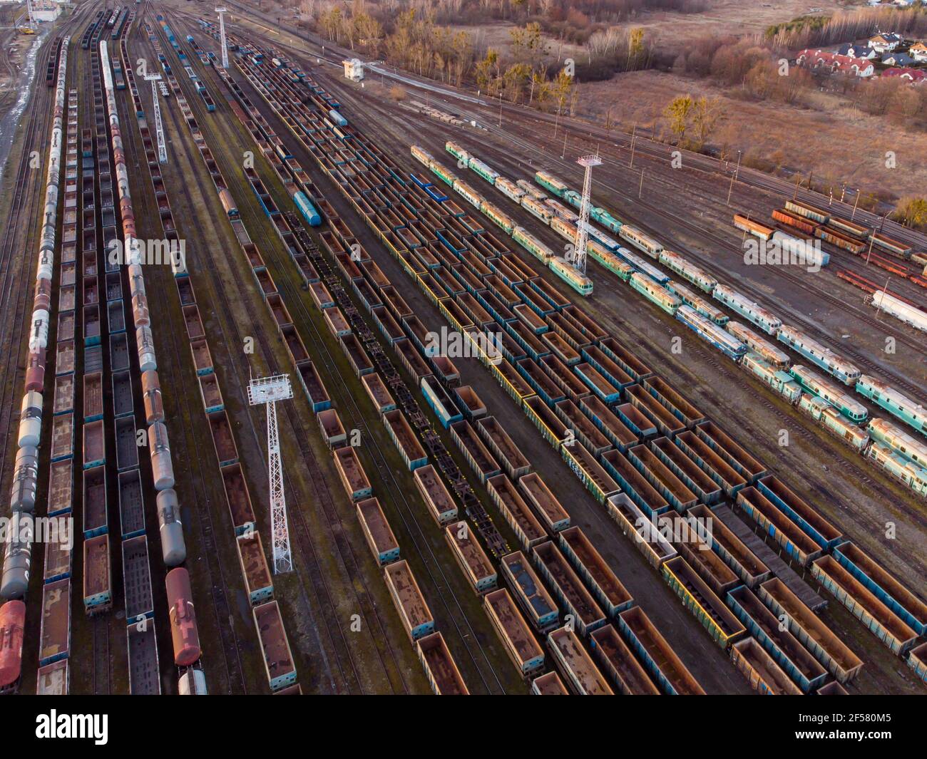 Drone shot over a railway sorting station with trains at sunset. Photo ...