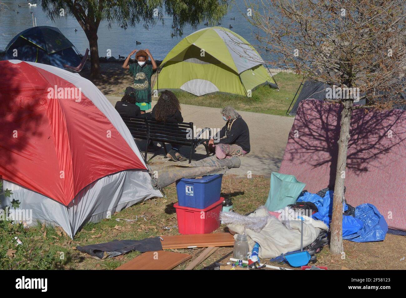 Los Angeles, United States. 24th Mar, 2021. Residents of a homeless ...