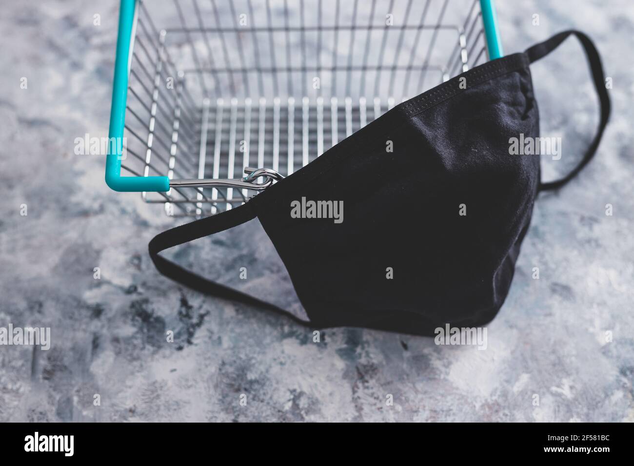 shopping basket with face mask, competition and retail industry ...