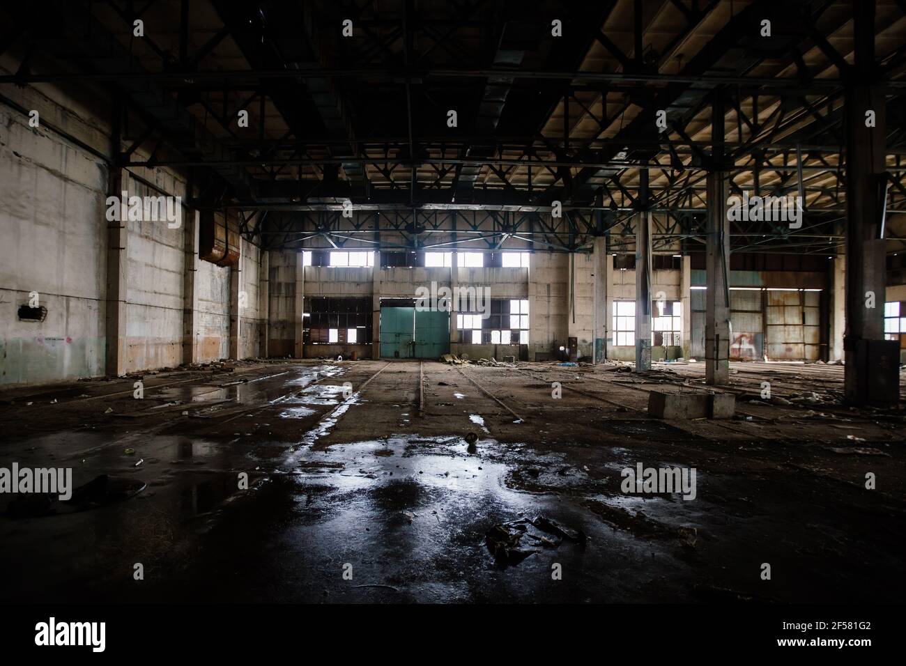 Old abandoned large industrial hall. Empty warehouse Stock Photo - Alamy