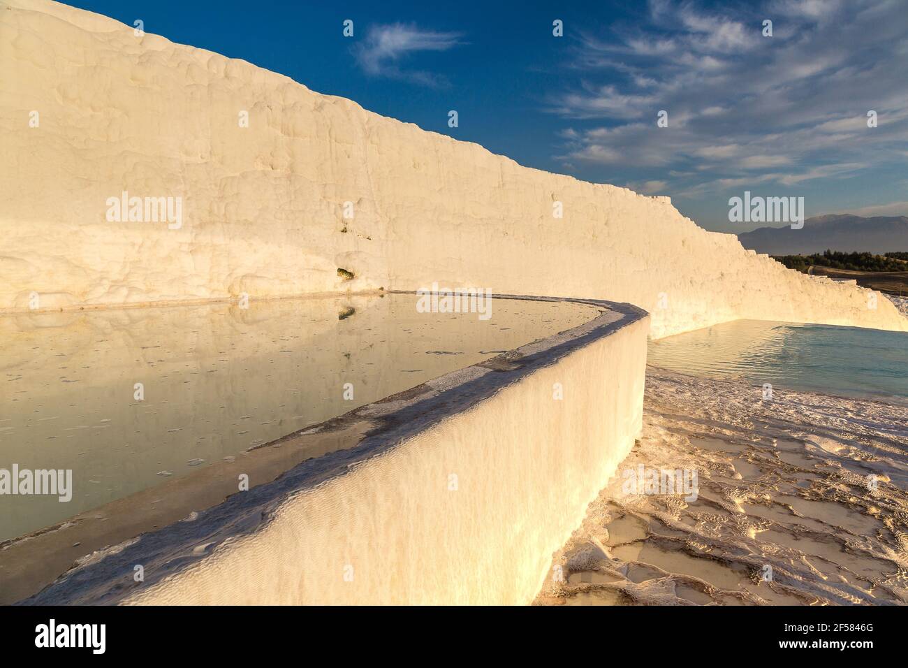 Travertine pools and terraces in Pamukkale, Turkey in a beautiful ...