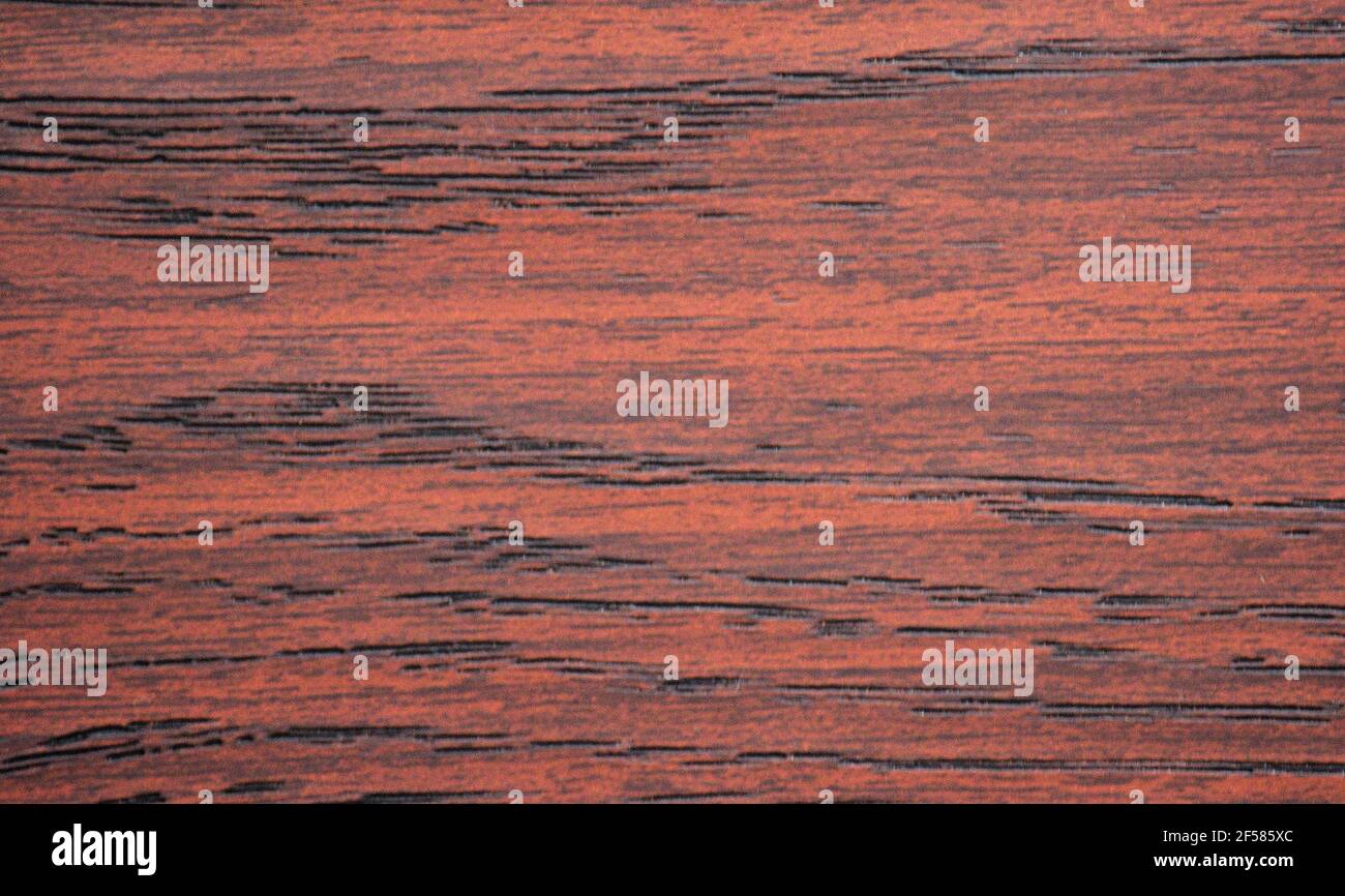 Red mahogany with black veins, close-up of a flat surface of natural ...