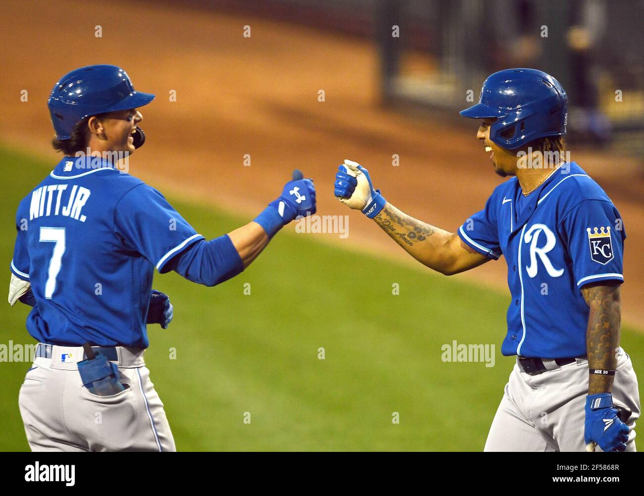 Kansas City RoyalsÕ Bobby Witt (left) fist bumps teammate Adalberto ...
