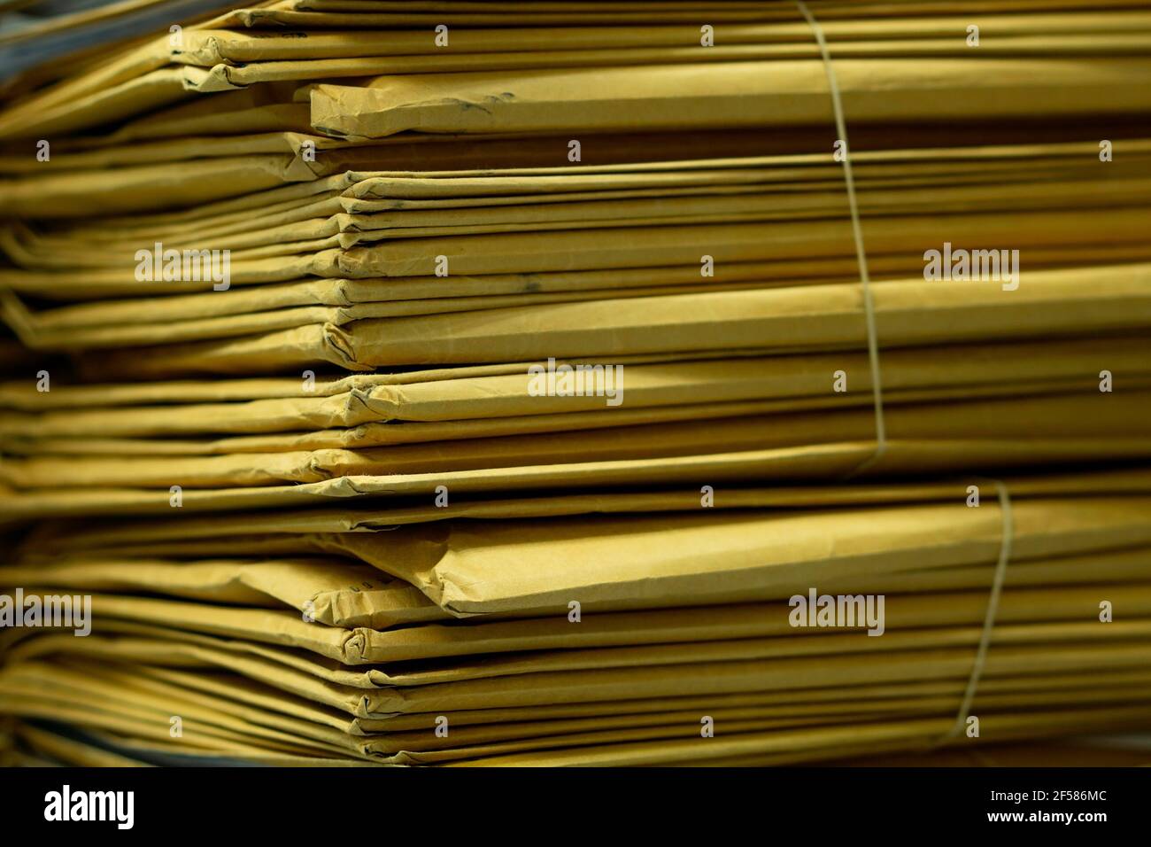 Close up, Piles or stacks of old brown envelopes on the office desktop ...