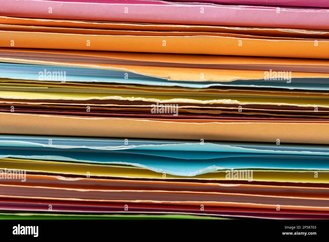 Close up of Stack of multi colors file folders for storing paper Stock ...