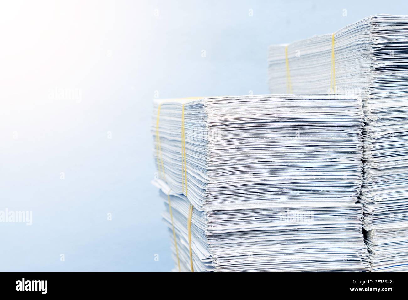 stack of documents on desktop in office Stock Photo - Alamy
