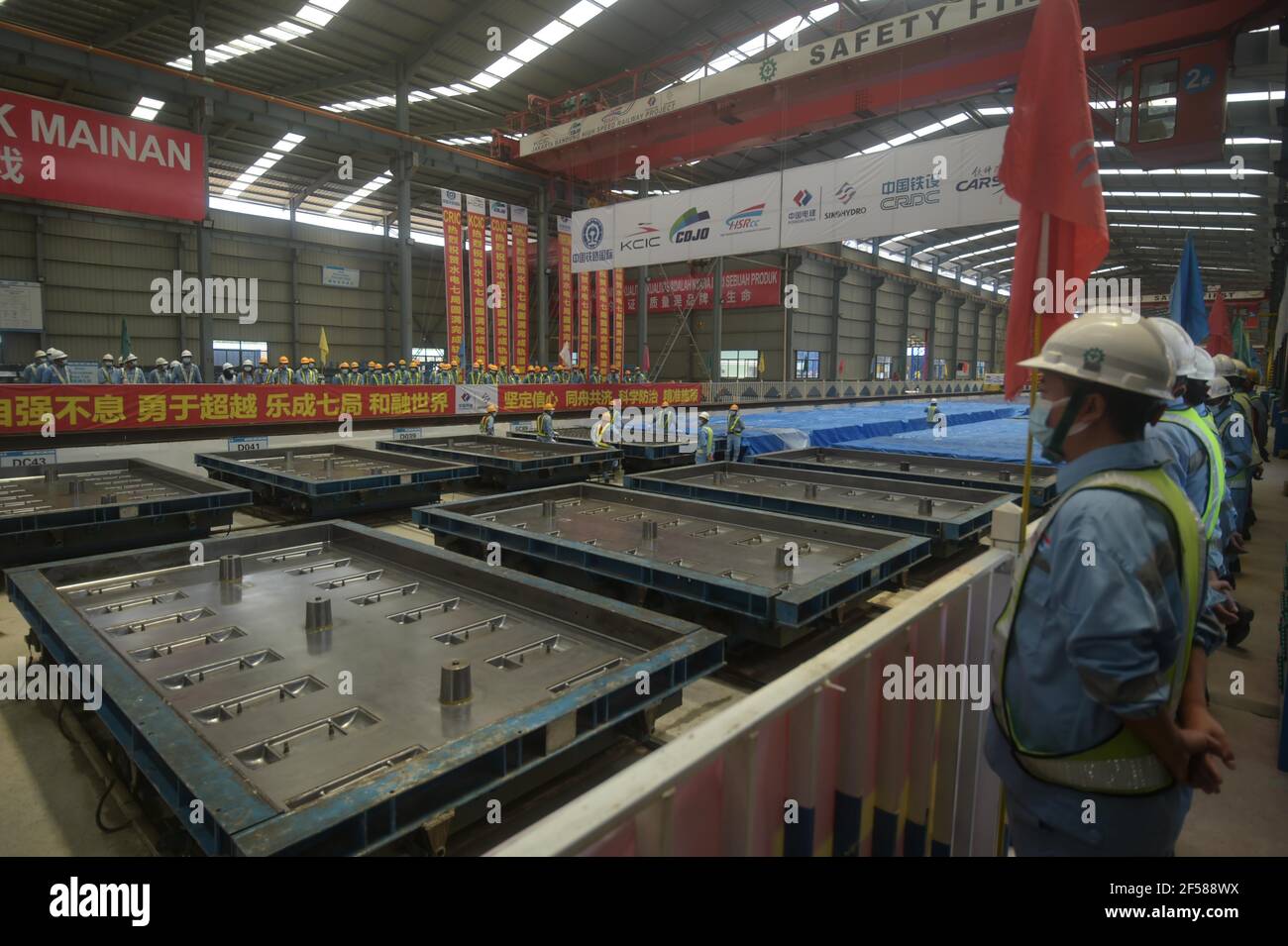 Jakarta, Indonesia. 24th Mar, 2021. Workers operate at a construction ...