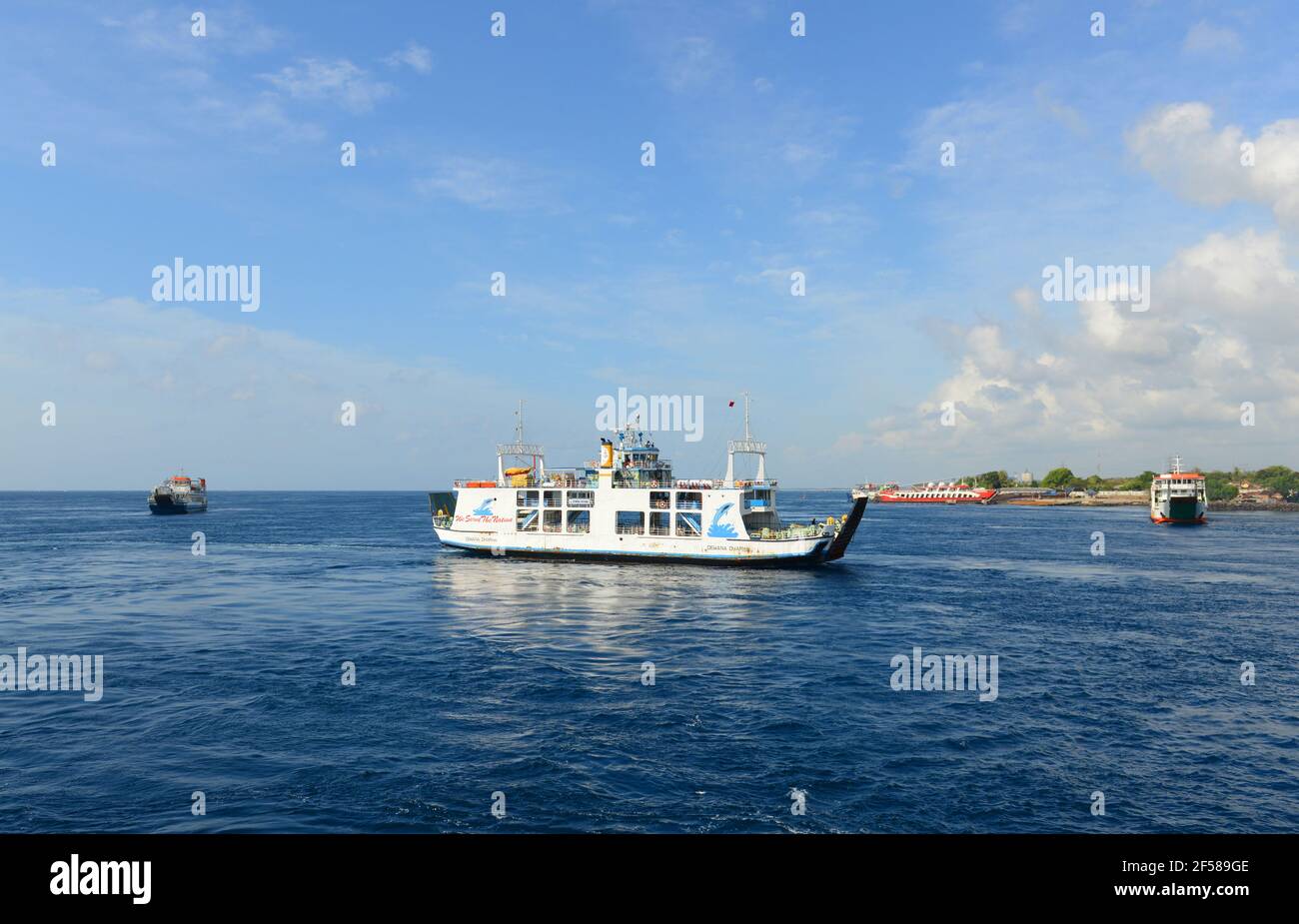 Ships crossing the Bali strait between the islands of Bali and Java in ...