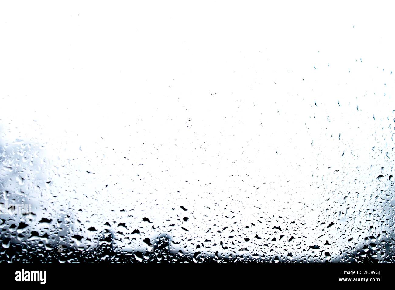 Raindrops on the window. Glass fogging and evaporation. Rain outside ...