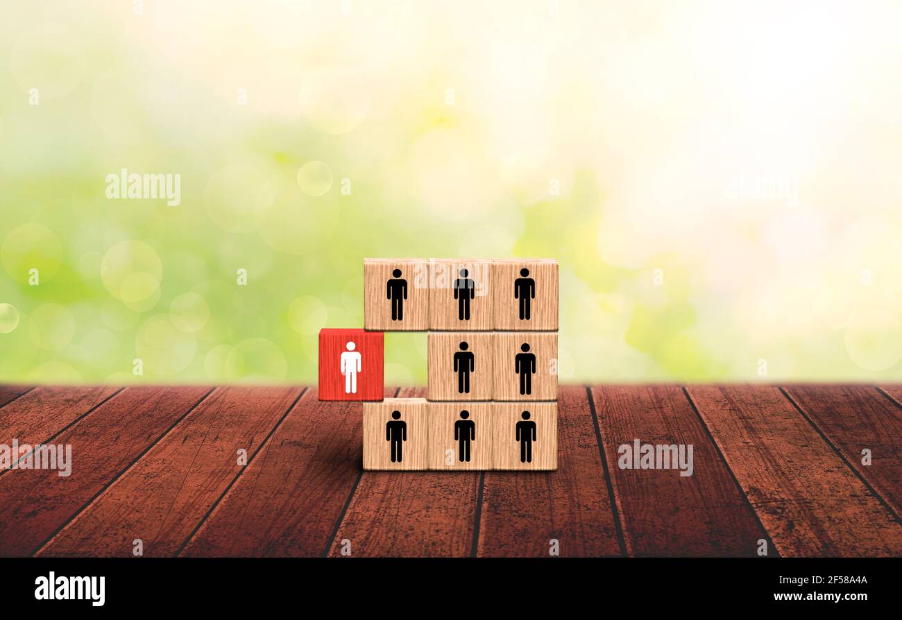 Typical red wooden block distinguishing from others. unique leader ...