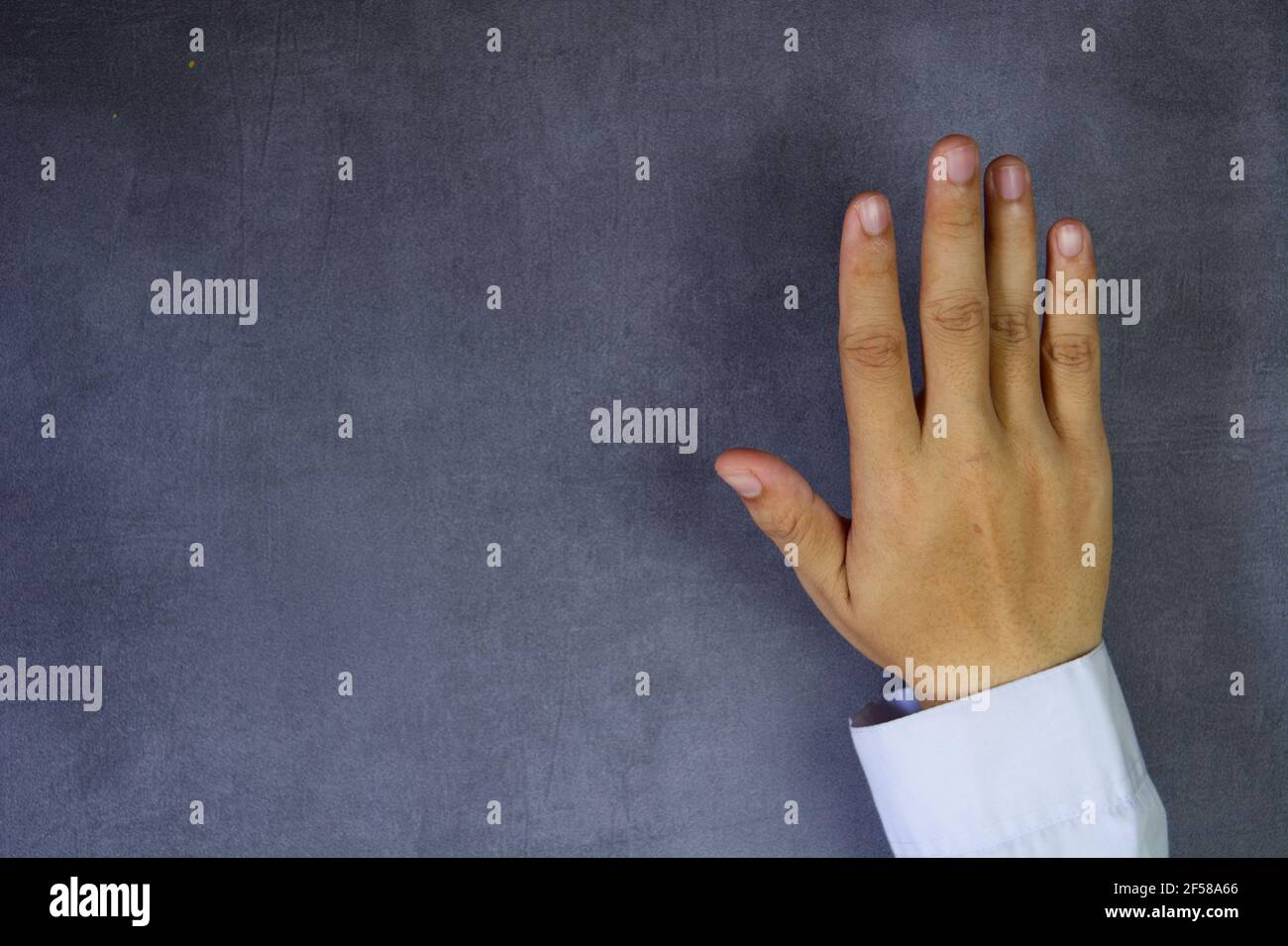 Hand gesture point five hi-res stock photography and images - Alamy