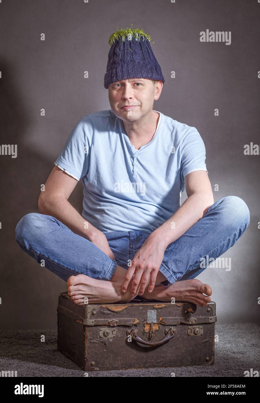 Cress growing out of the head. Portrait of a man. A symbol of renewal ...