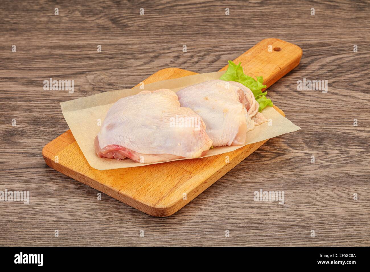 Raw chicken hip ready for cooking Stock Photo - Alamy