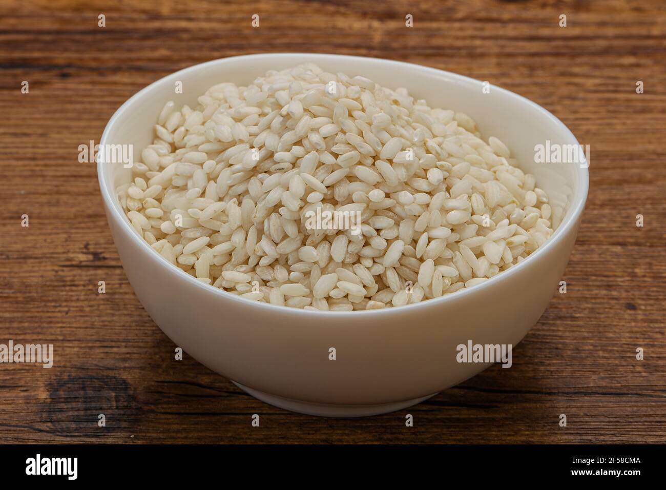 Raw Italian arborio rice for Risotto Stock Photo - Alamy